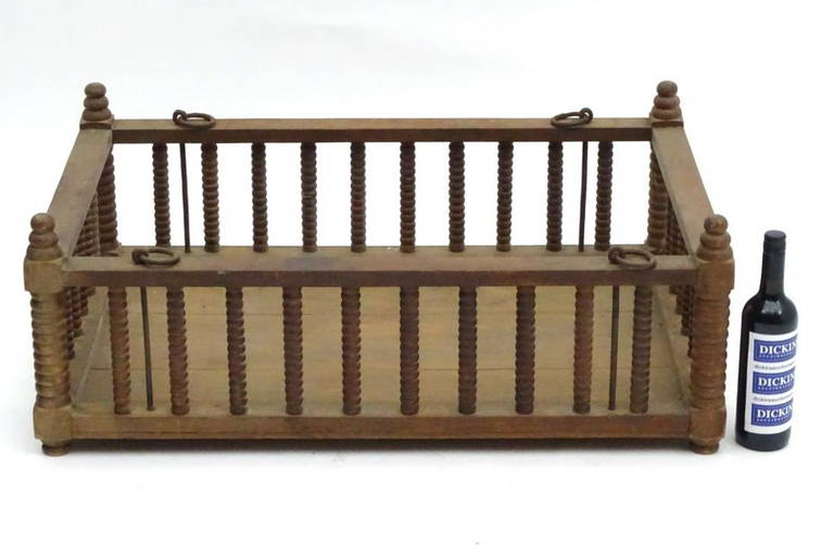 An Early 20thc Hanging Crib With Turned Wooden Railings