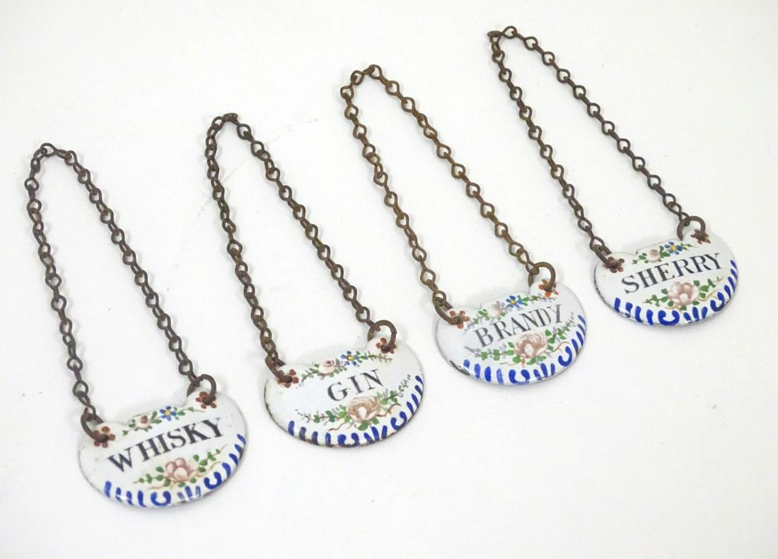 A Set Of Four Vintage Enamel Decanter / Wine Labels