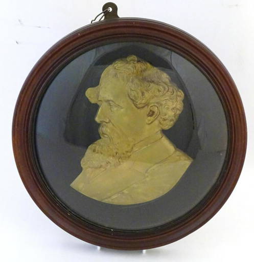 A 20thc Gilt Metal Wall Plaque Depicting Charles Dickens Within A ...