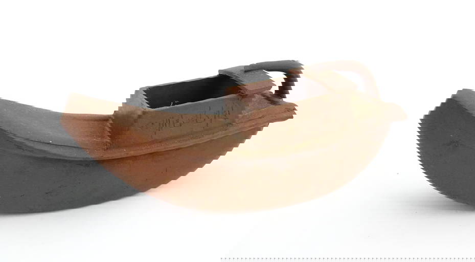 A Chinese Yixing Teapot Modelled As A Boat With Incised Character Marks ...