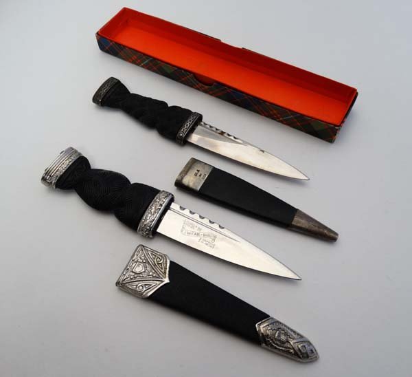 Skein Dhu : two Scottish Sgian-dubh , one with a black