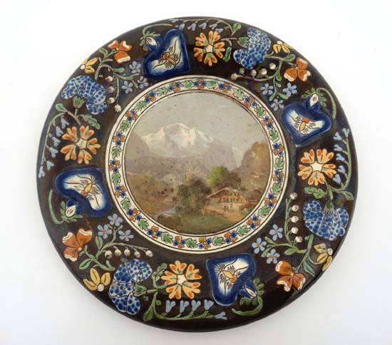 A Swiss '' Thoune '' Pottery Plate, Painted With Alpine