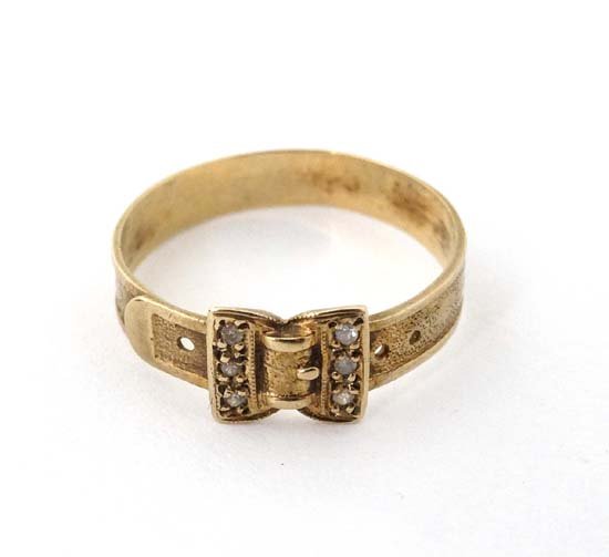 A 9ct Gold Ring Formed As A Belt And Buckle, The Buckle