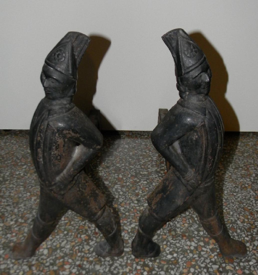PAIR CAST IRON ANDIRONS HESSIAN RED COAT SOLDIER
