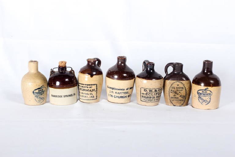 Seven Stoneware Mini Merchant Advertising Jugs
