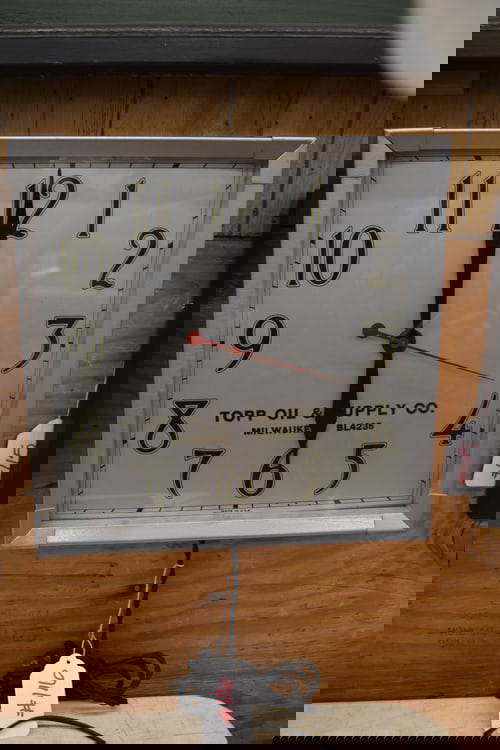 Topp Oil Clock Auction