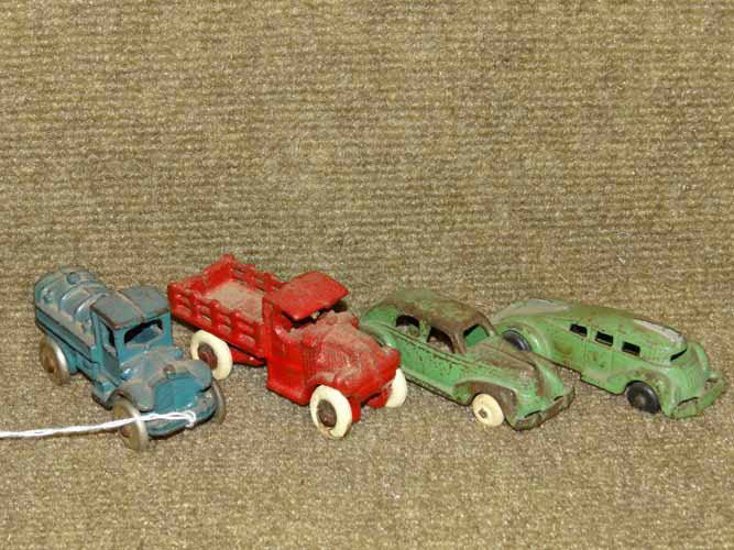 (4) Cast Iron Cars/trucks