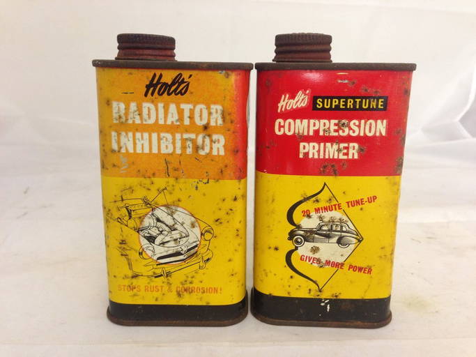 Two 1950s Holts Cans.