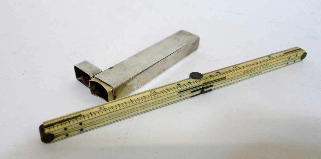 An ivory folding rule, by J.Rabone & Sons, in a si