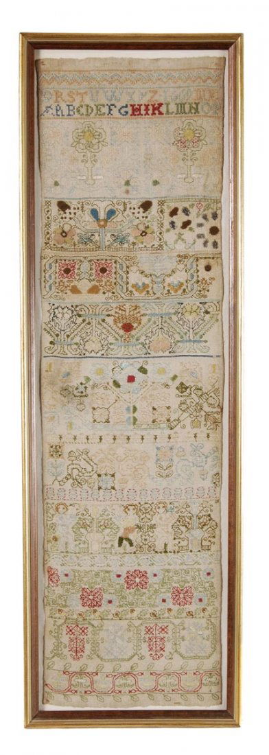A long sampler, 1669 ME, designed with rows of the