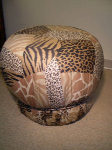 Animal Print Overstuffed Upholstered Hassock