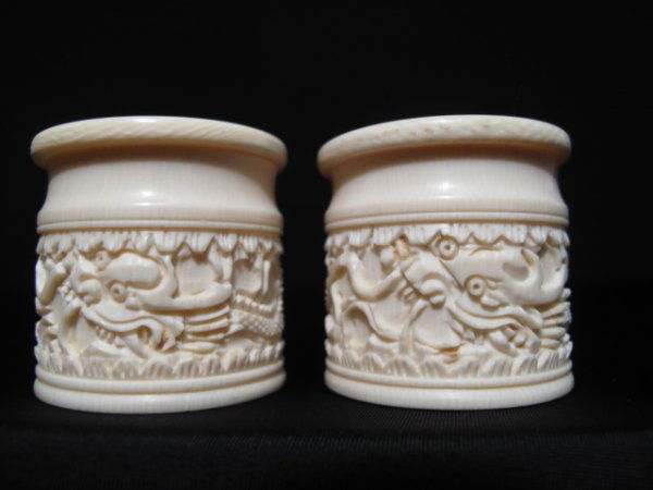245: CHINESE CARVED IVORY SALT AND PEPPER SHAKERS