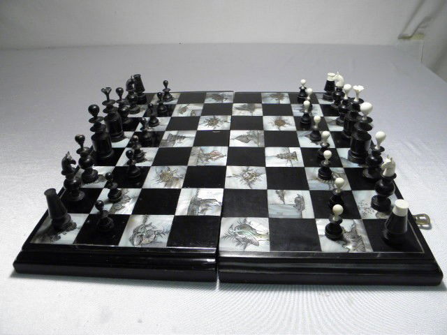318: BLACK LACQUER & ETCHED MOTHER OF PEARL CHESS SET