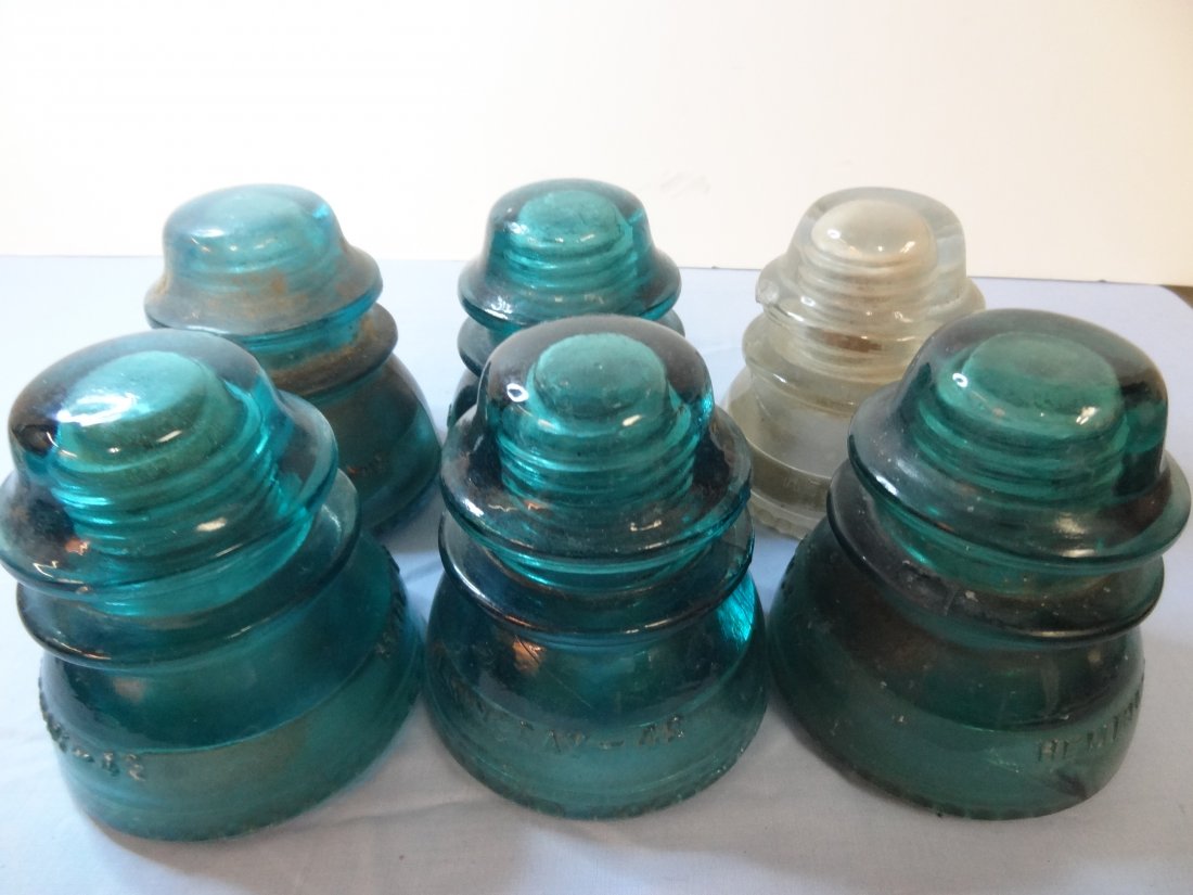 SIX VINTAGE NORTHERN CALIFORNIA GLASS INSULATORS; HEMIN