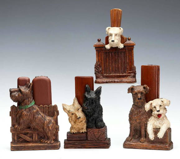 A Collection Of Syroco Brush Holders With Dogs