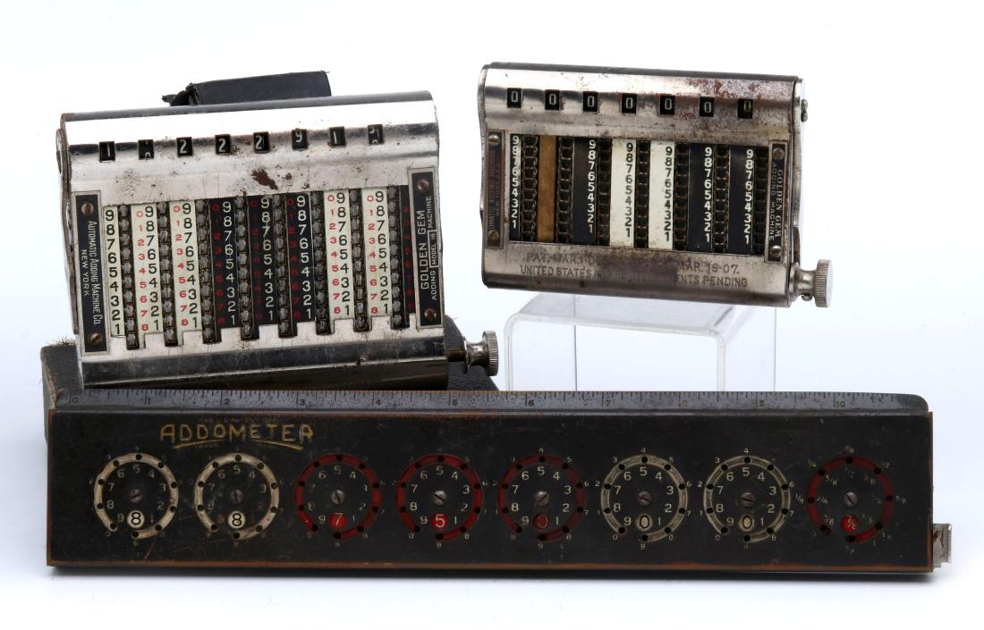 A COLLECTION OF MECHANICAL ADDING MACHINES C 1910
