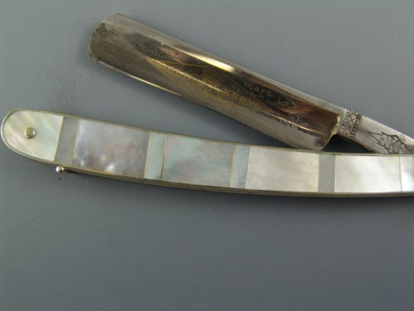 2247: GOLD KRONE PEARL HANDLED ANTQ STRAIGHT RAZOR