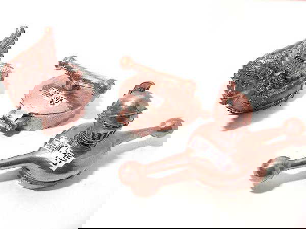 1295: THREE ANTIQUE RADIATOR CAPS