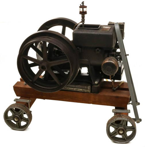 An Alamo Mfg 1 1/2 Horsepower Hit And Miss Engine