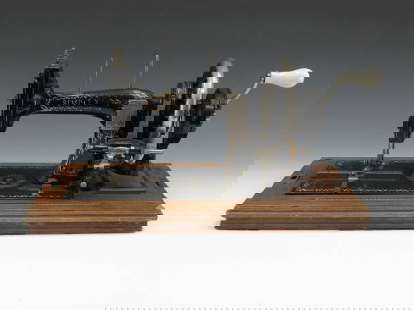 An Adam Opel Simplex Sewing Machine And Case