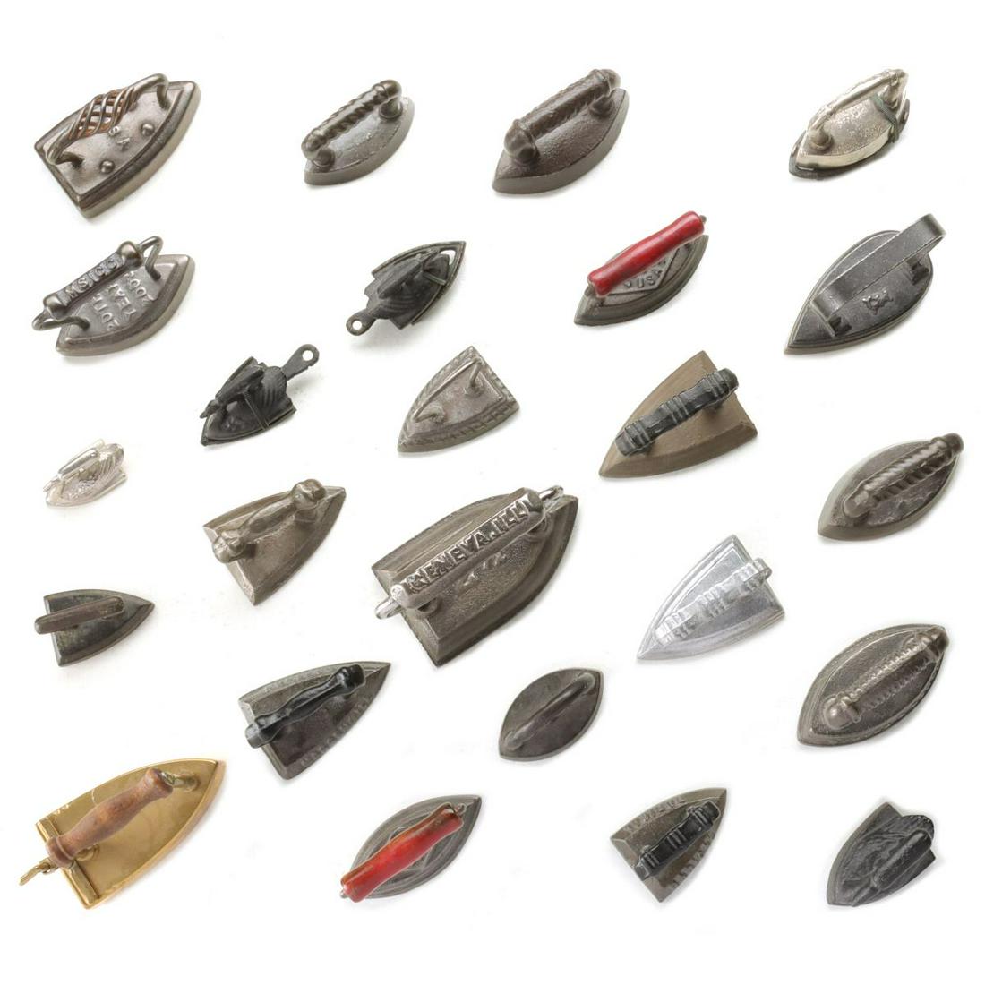 A Collection Of Toy And Miniature Sad Irons