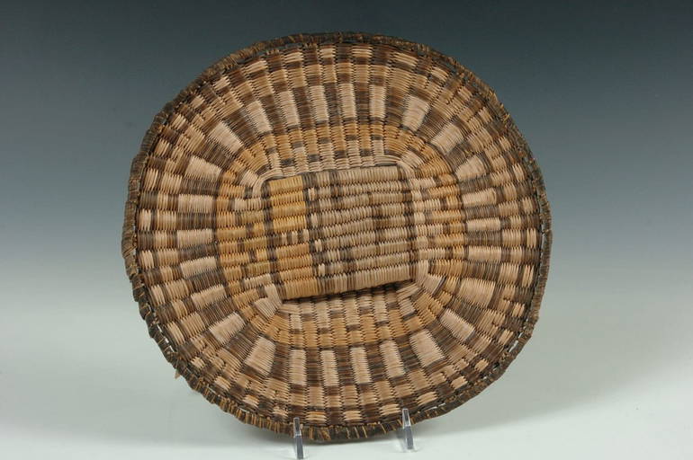 A Hopi Basketry Plaque With Kachina
