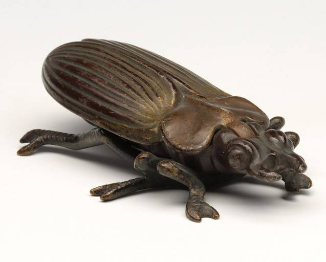 A Detailed Cast Iron Beetle Match Safe With Brass