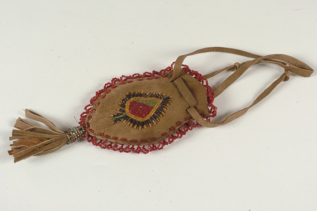 A WOODLANDS BEADED BUCKSKIN POUCH