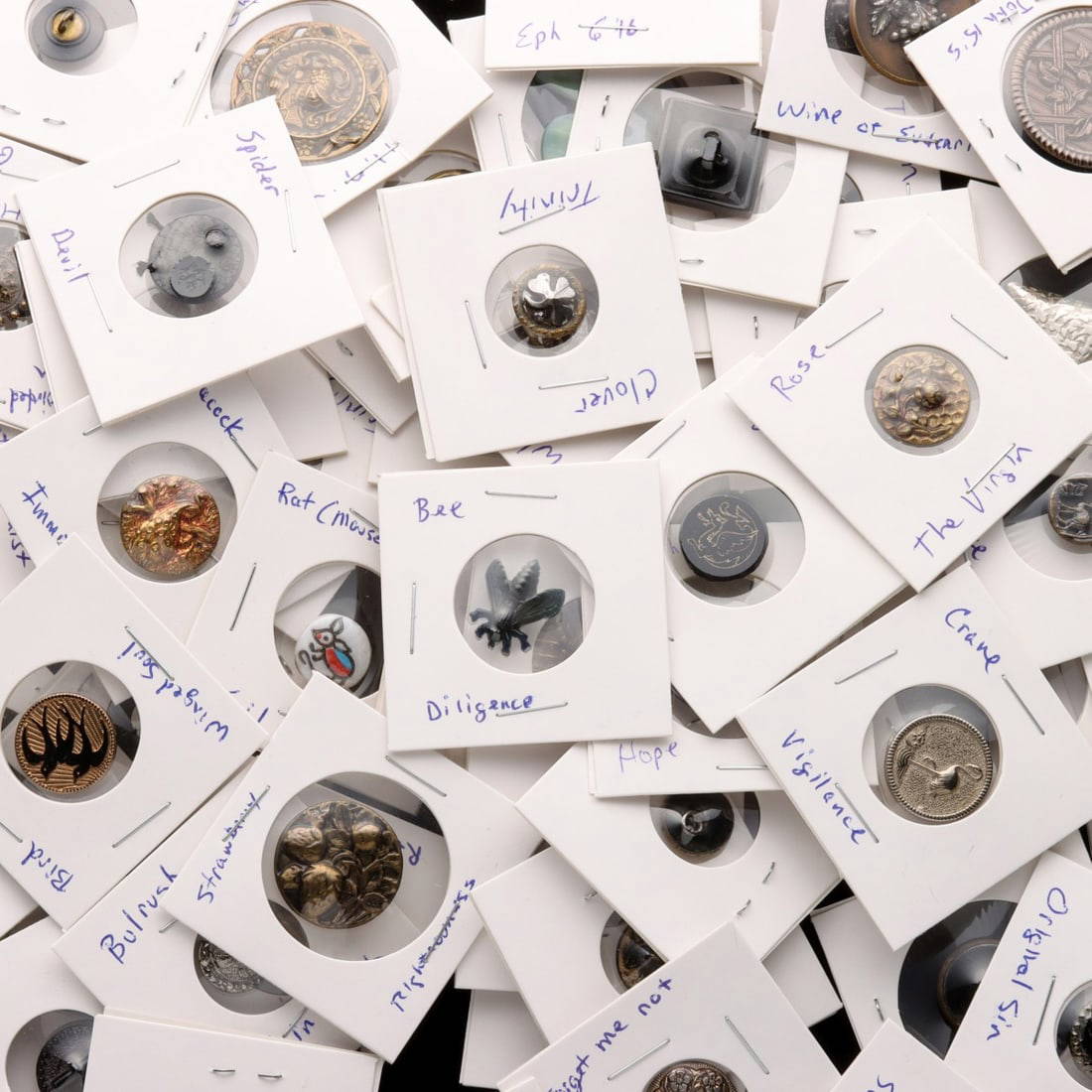 Seventy-four Antique & Collectible Sewing Buttons Auction