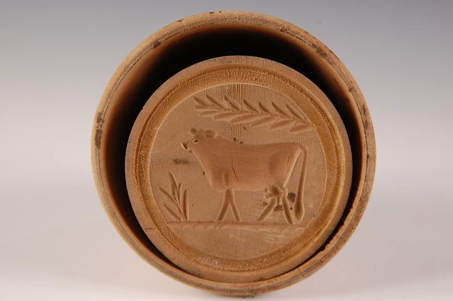 THREE COW-THEMED WOODEN BUTTER MOLDS : Lot 79