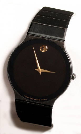 A Gent's Black Movado Model 84 40 880 A Wrist Watch