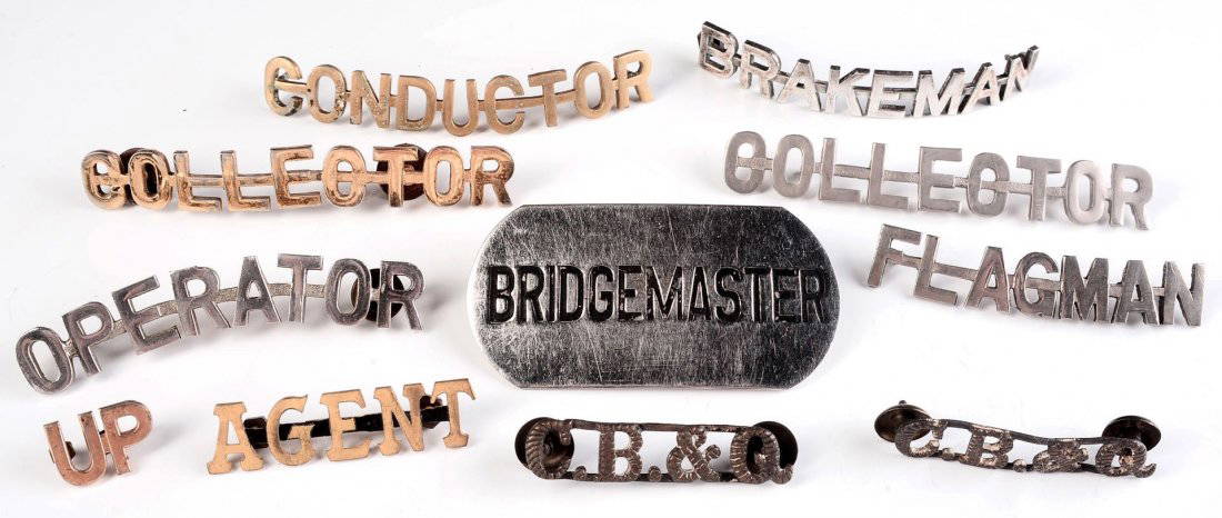 Eleven Assorted Railroad Cap Badges