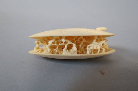 Chinese Ivory Carved Shell With Animal Inside