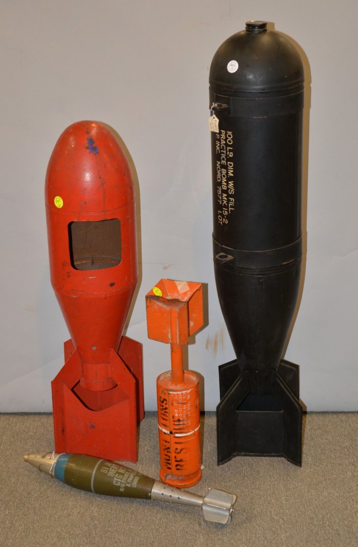 FOUR ARIEL BOMB SHELLS, including an MK15, MK 106 pract