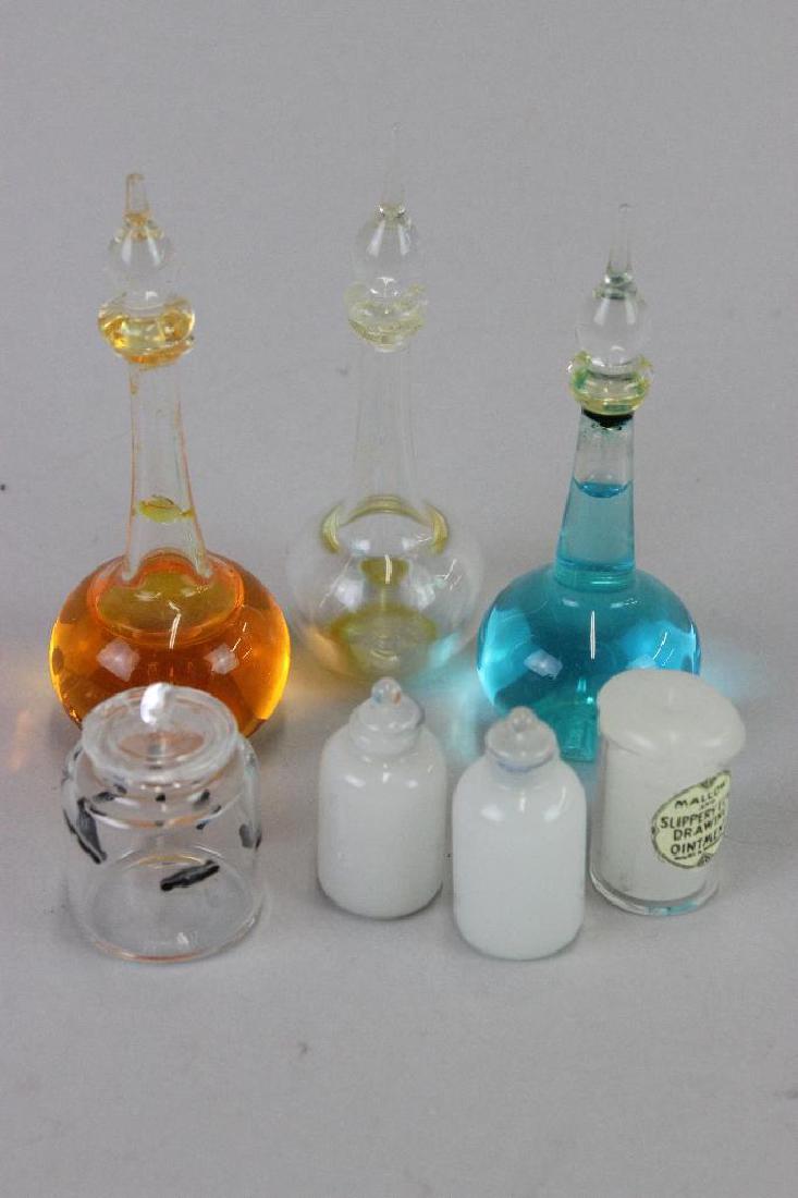 Artist made jar of leeches, large bottles,