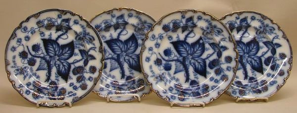Set Of Four Flow Blue China Plates