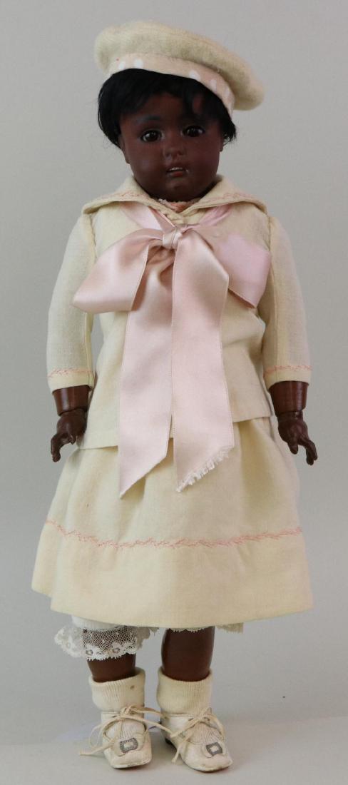 ANTIQUE BISQUE HEAD BLACK DOLL.