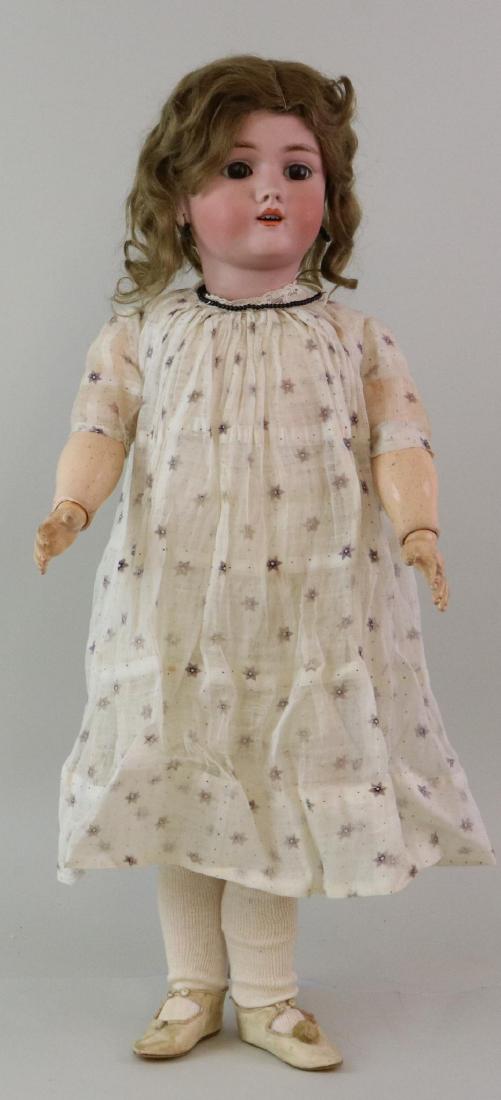 ANTIQUE BISQUE HEAD GERMAN DOLL.
