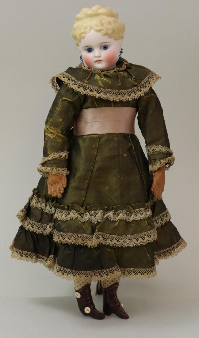 ANTIQUE BISQUE HEAD GERMAN DOLL.