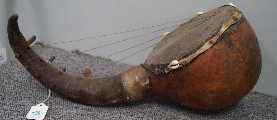 African Gourd/horn Stringed Instrument. Length 15"