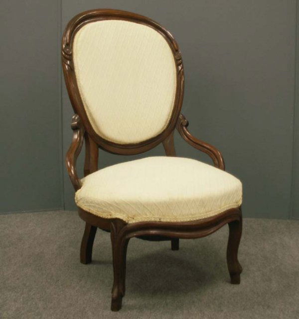 283: VICTORIAN CARVED WALNUT BUSTLE CHAIR