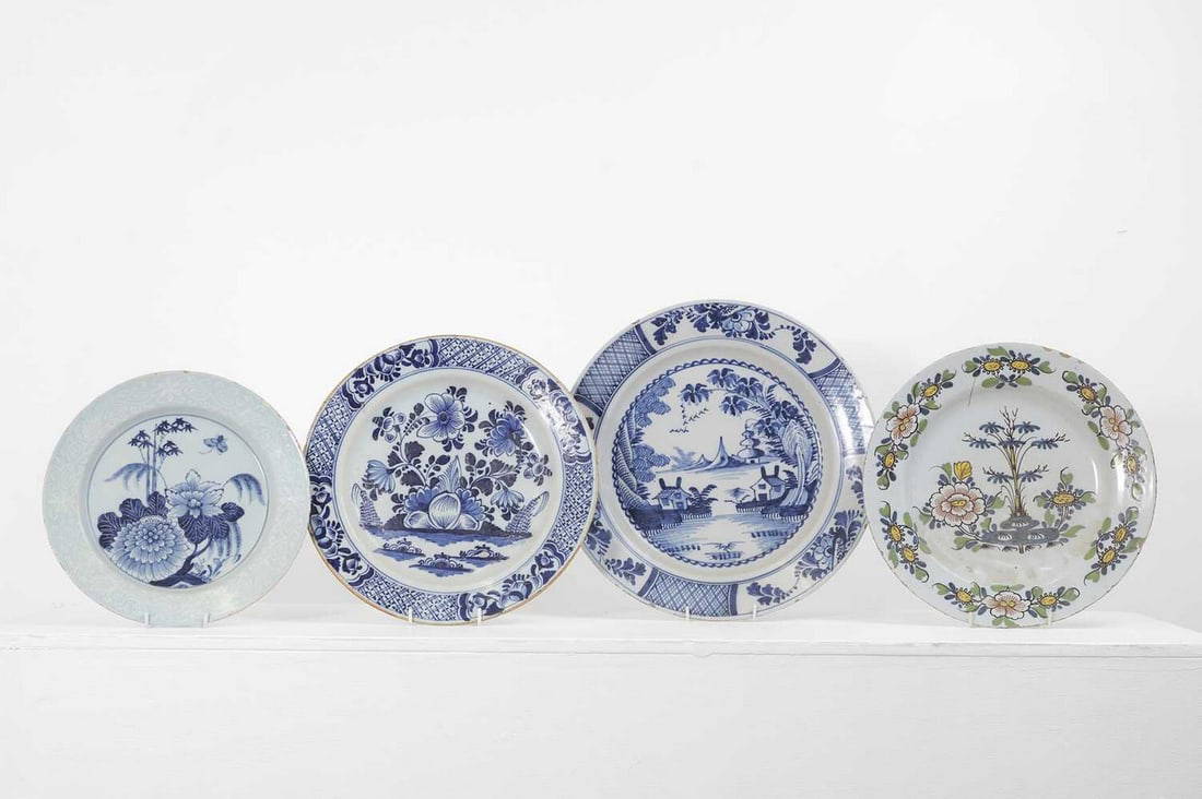 A Group Of Four Large Delft Plates, Auction