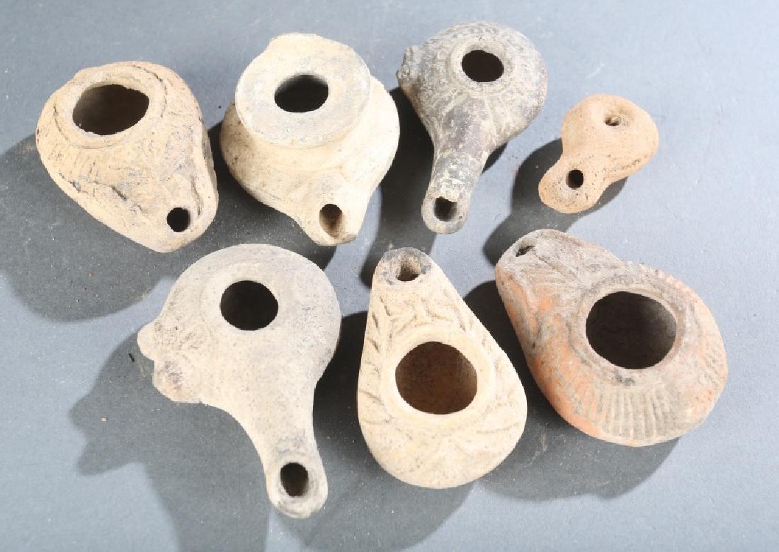 7 Ancient Oil Lamps.