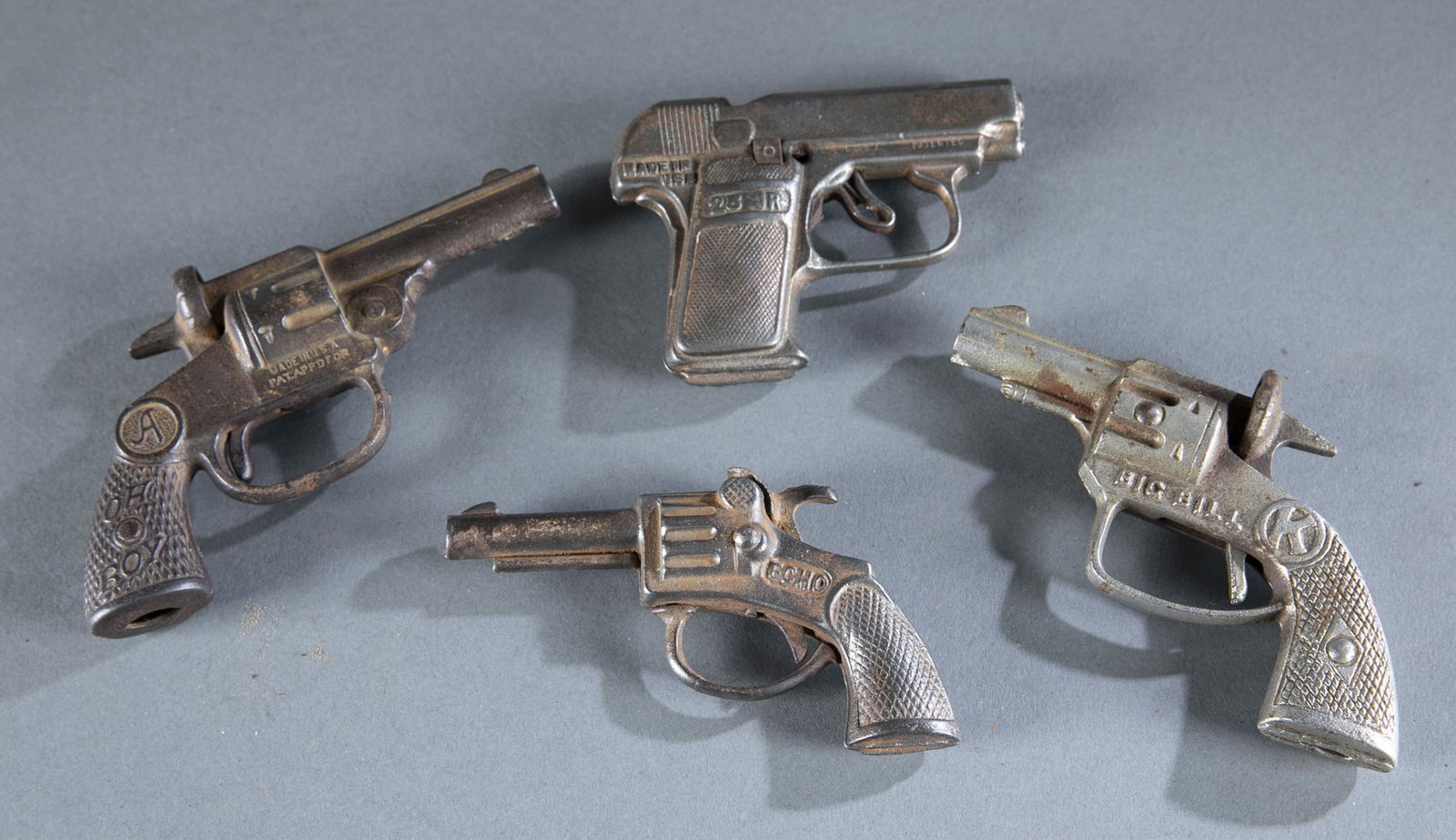 4 vintage cast iron cap guns. - Mar 08, 2022 | Quinn's Auction ...