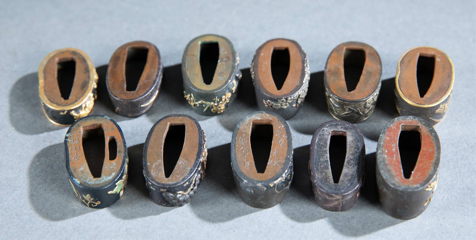 11 Japanese Fuchi Kashira. Auction