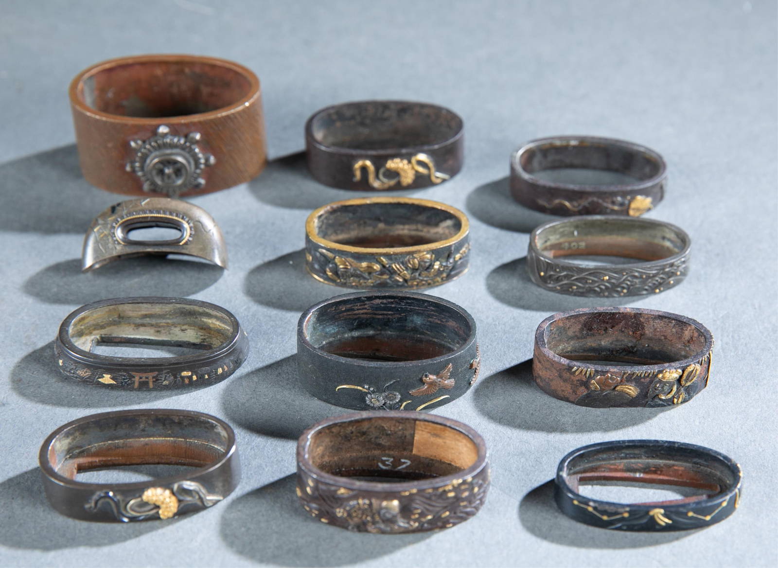 11 Japanese Fuchi With One Kashira. Auction