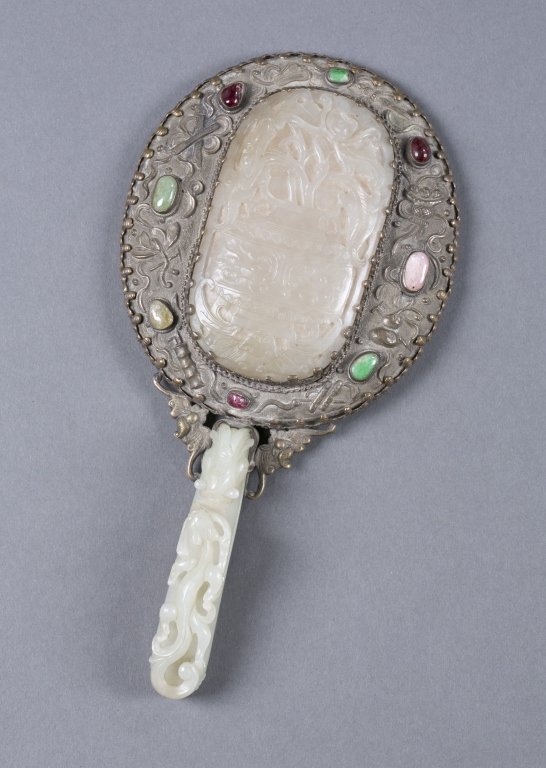 A Chinese jade medallion hand mirror.