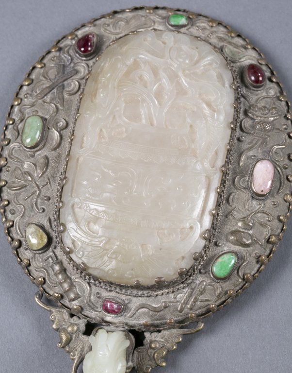 A Chinese jade medallion hand mirror. : Lot 380