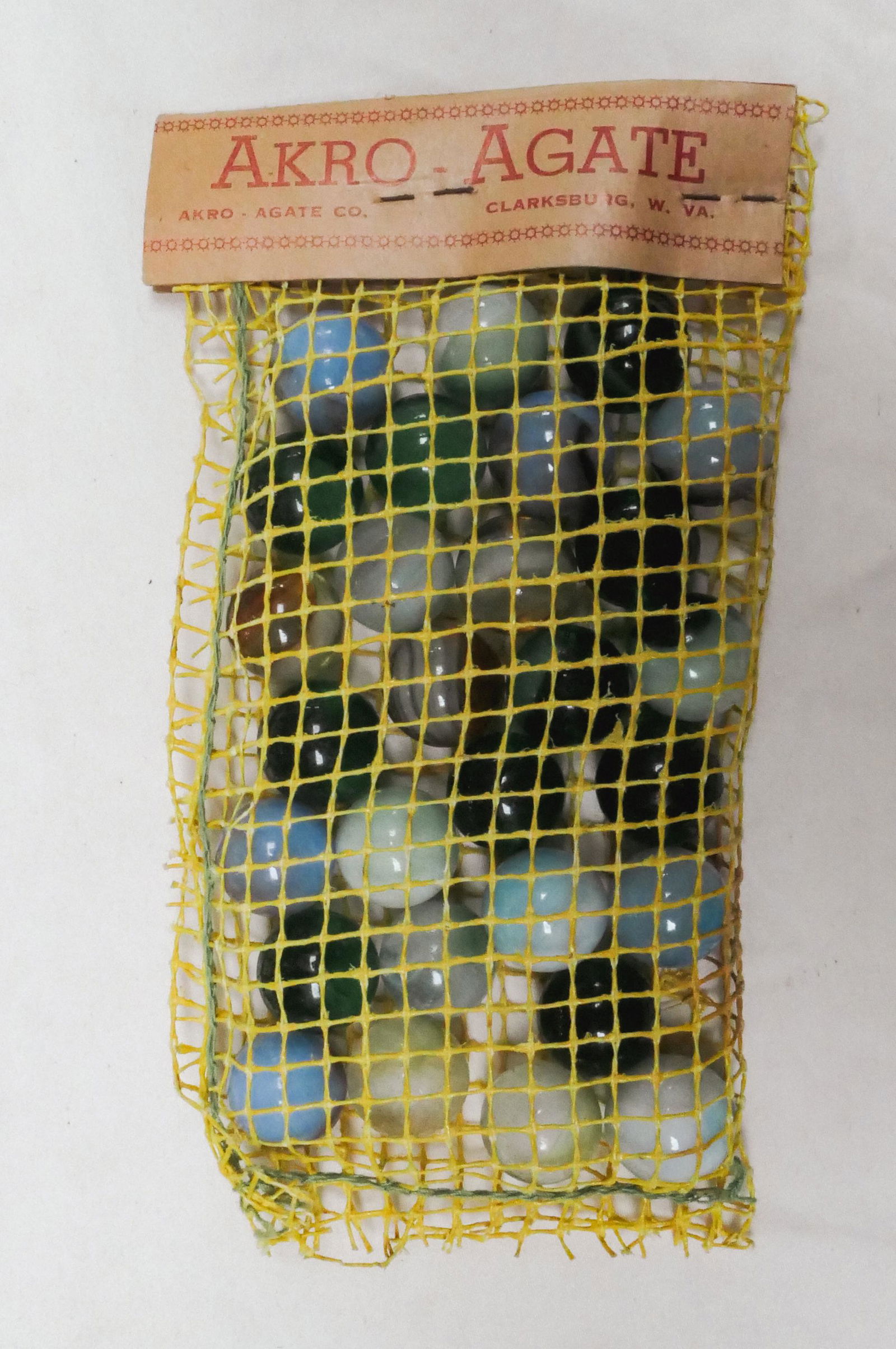 Marbles: Akro Agate Company, Original Package. Hy Grade Mesh Bag.