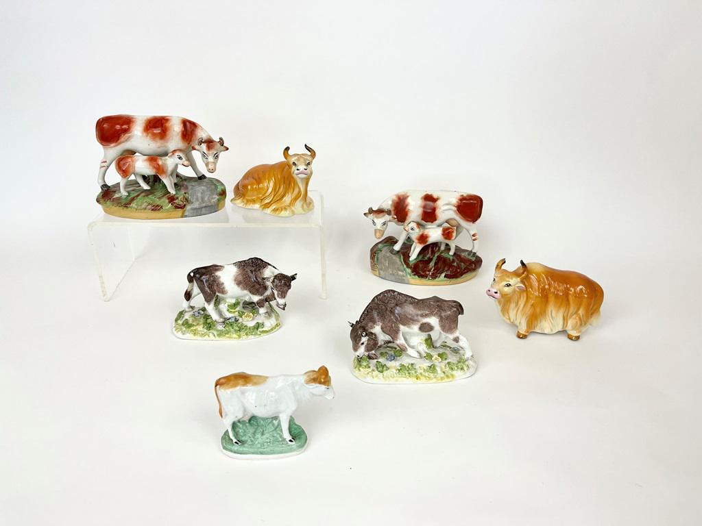 Seven Assorted Porcelain Figures Of Cows. 19th 20th Century.